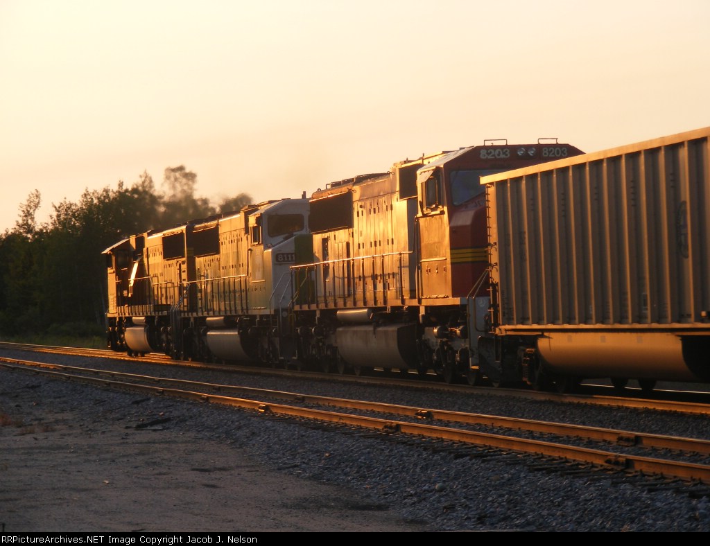 A coal empty going into the sunset